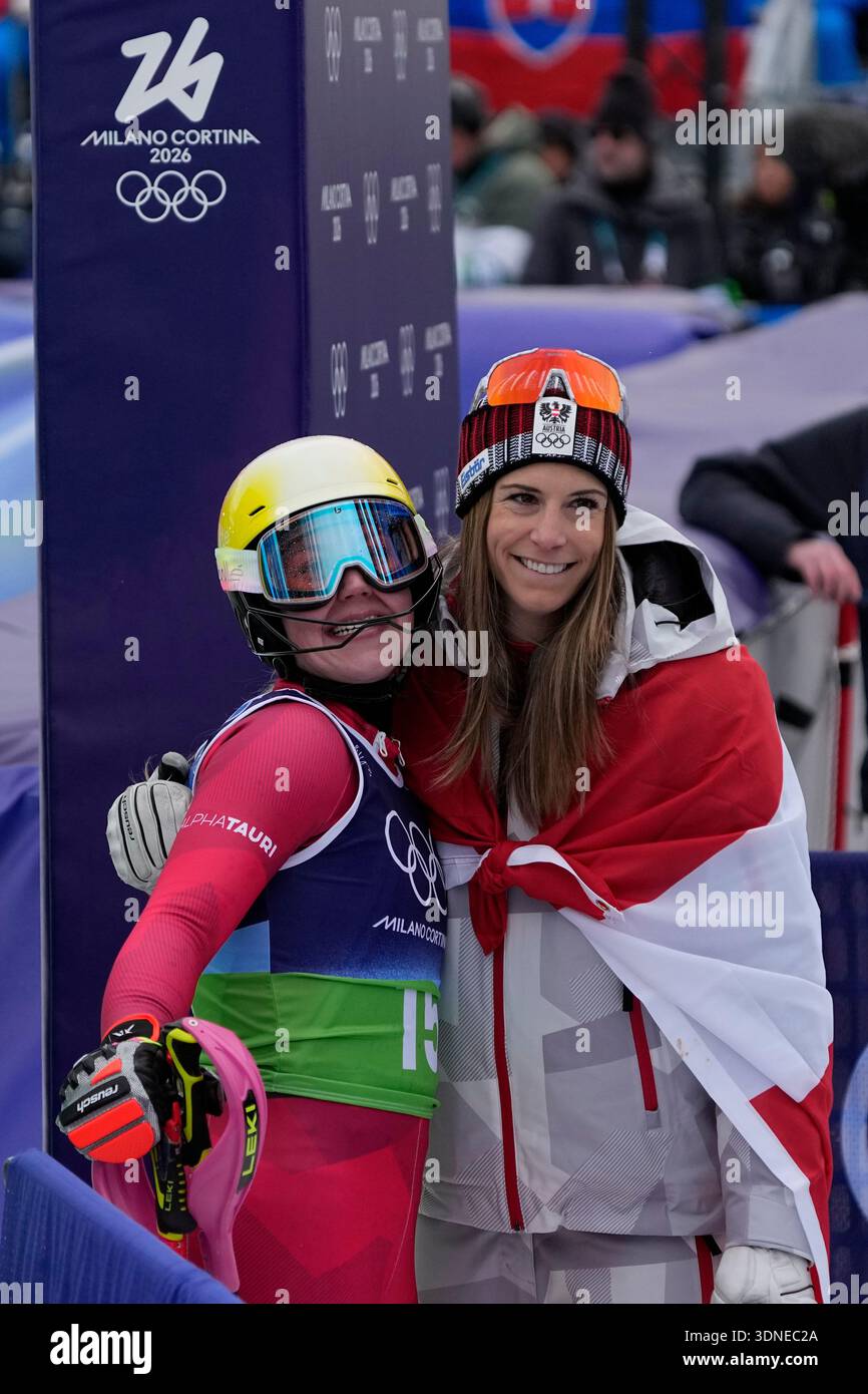 Austria's Lisa Hoerhager, left, is hugged by her teammateAustria's ...