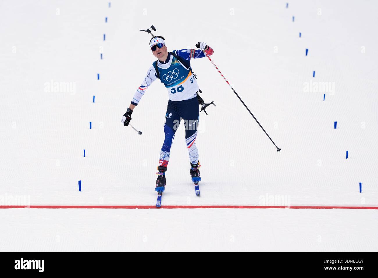 Eric Perrot, of France, crosses the finish line in the men's 20 ...