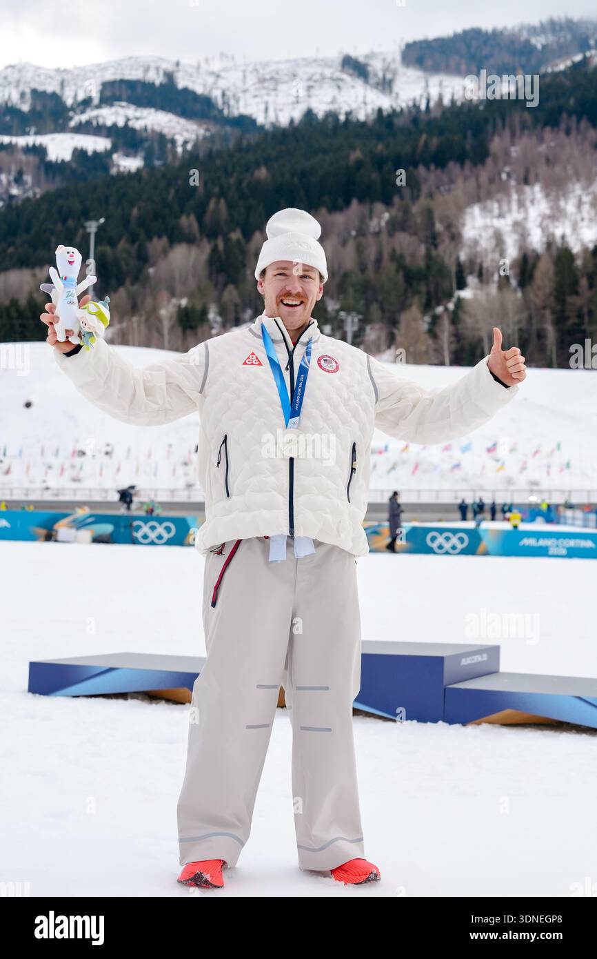 Ben Ogden, of the United States, poses after winning the silver medal ...