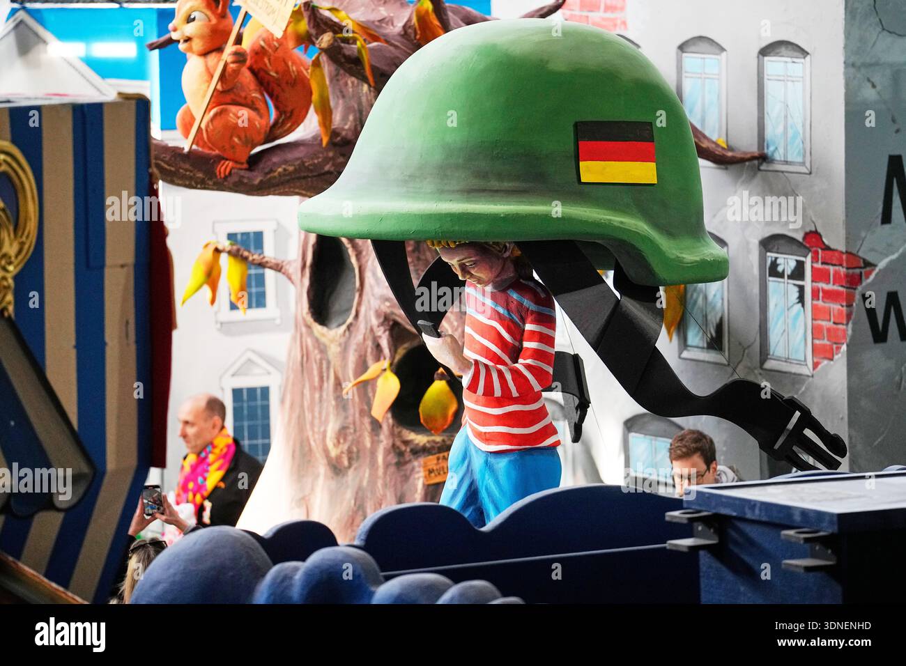 A carnival float depicts the compulsory military service for Germany at ...