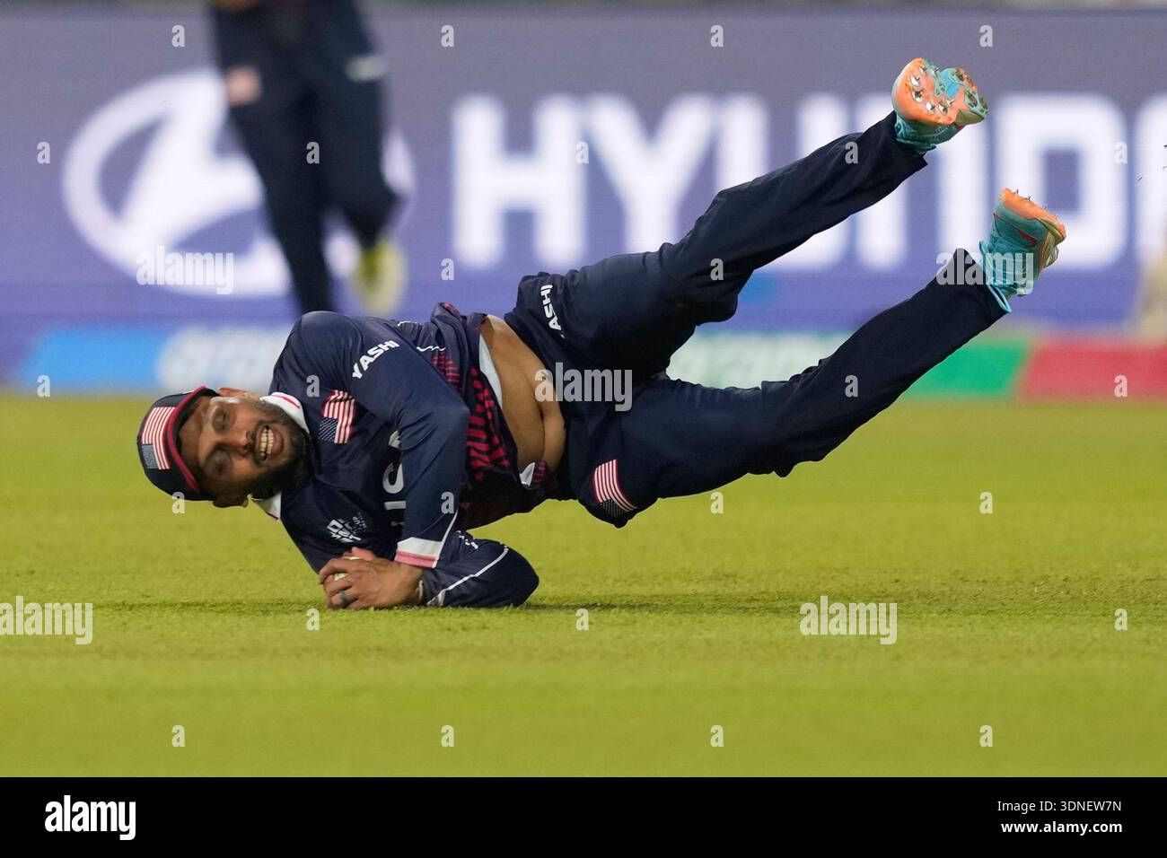 United States' Milind Kumar takes the catch to get Pakistan's Babar ...