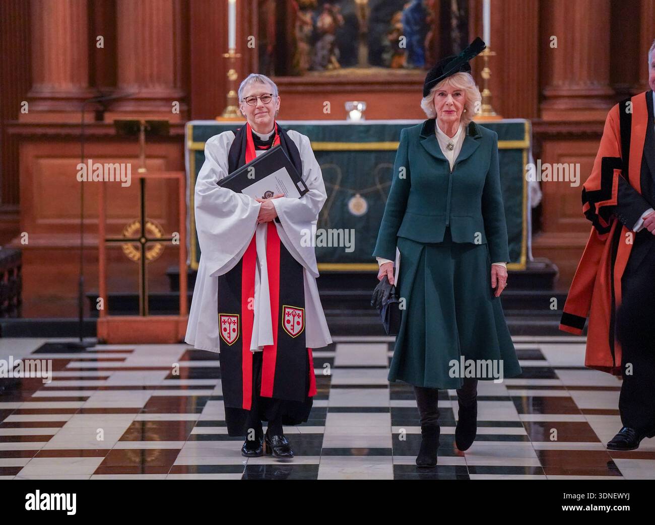Queen Camilla (right), with the Reverend Canon Dr Alison Joyce, attends ...