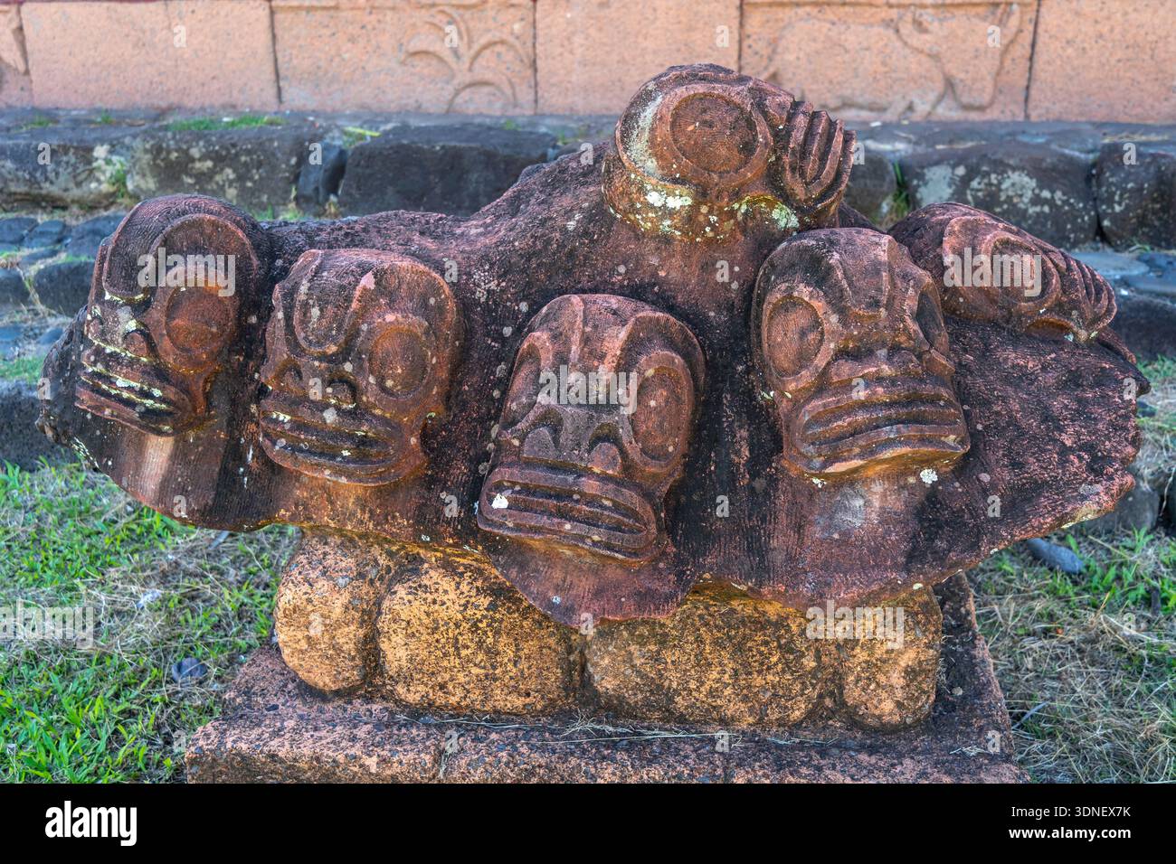 A traditional stone tiki statue in Atuona, Hiva Oa, Marquesas Islands ...