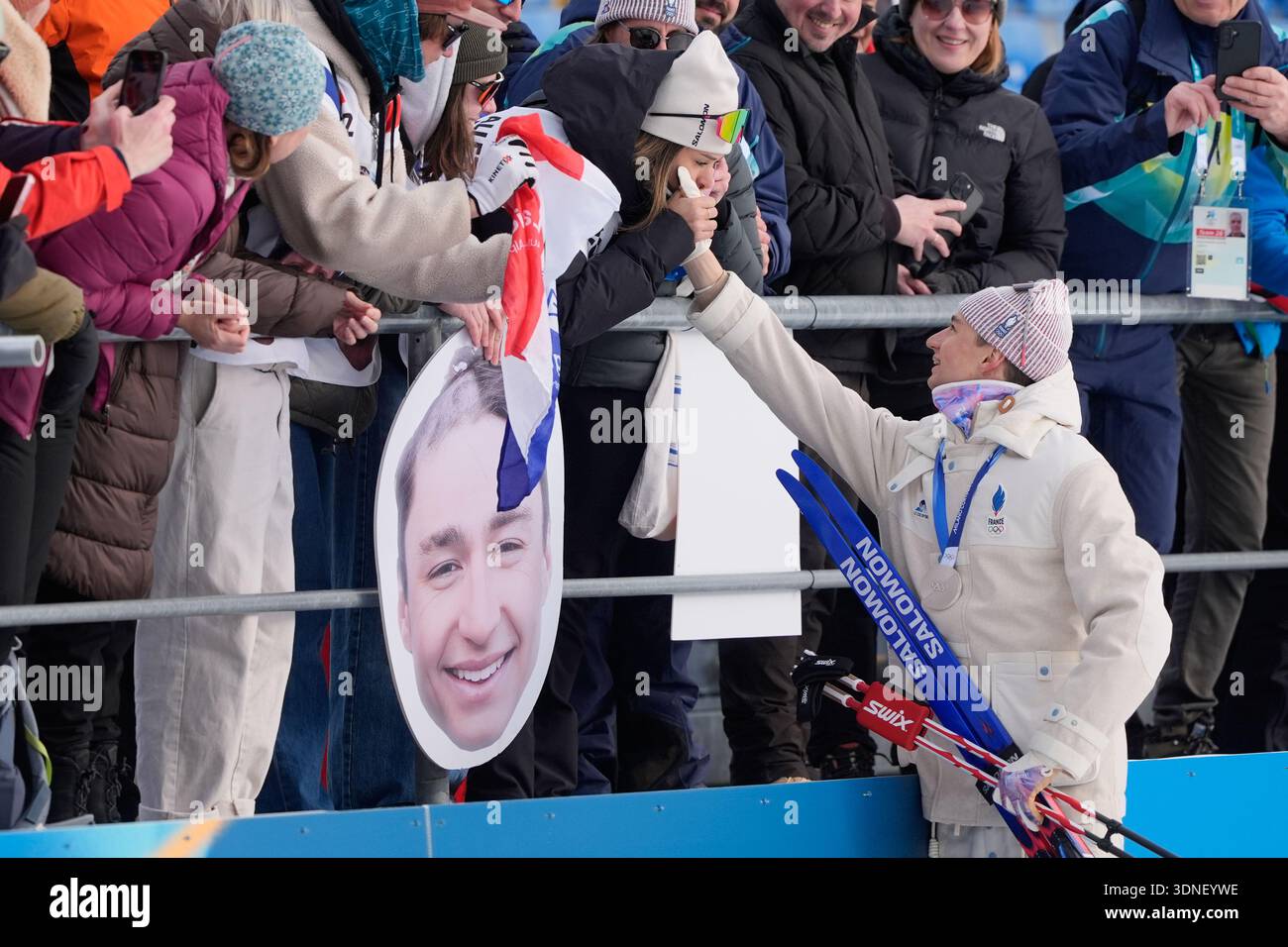 Eric Perrot, of France, greets the crowd after winning silver in the ...
