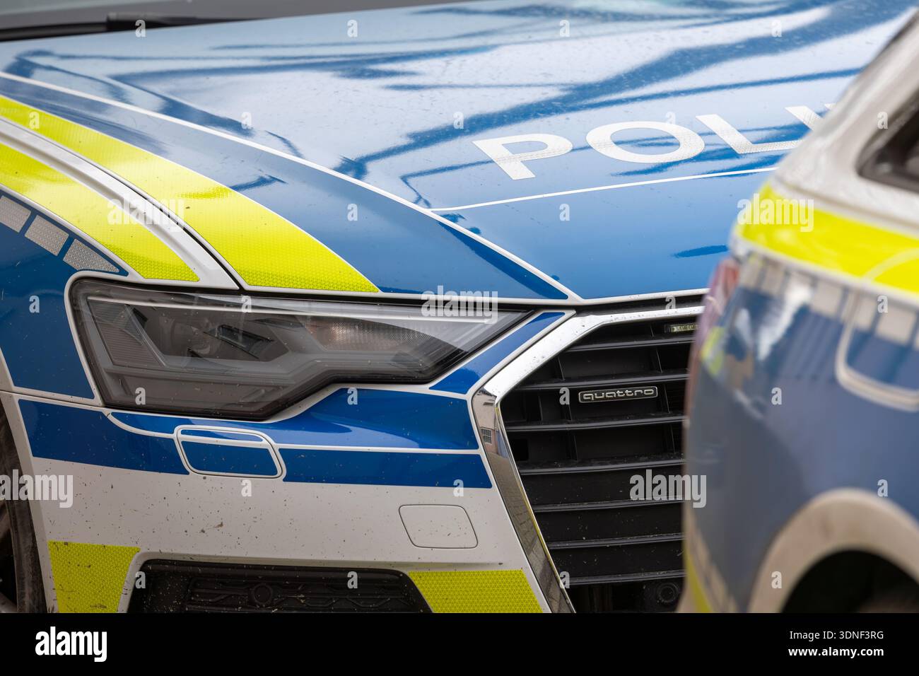 Symbolic image police operation: Close-up of police emergency vehicles ...