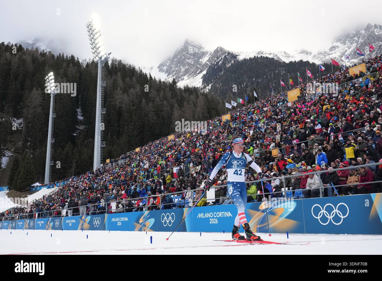 Campbell Wright, of the United States, crosses the finish line in the ...
