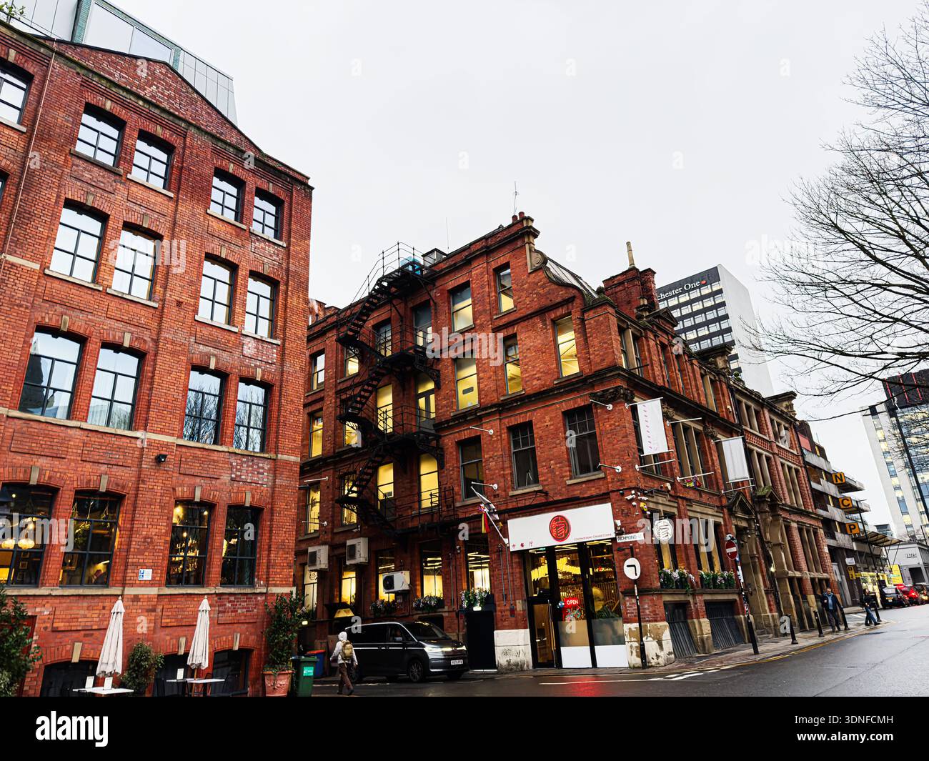 Manchester, UK - January 22, 2026: Urban scene in Manchester with red ...