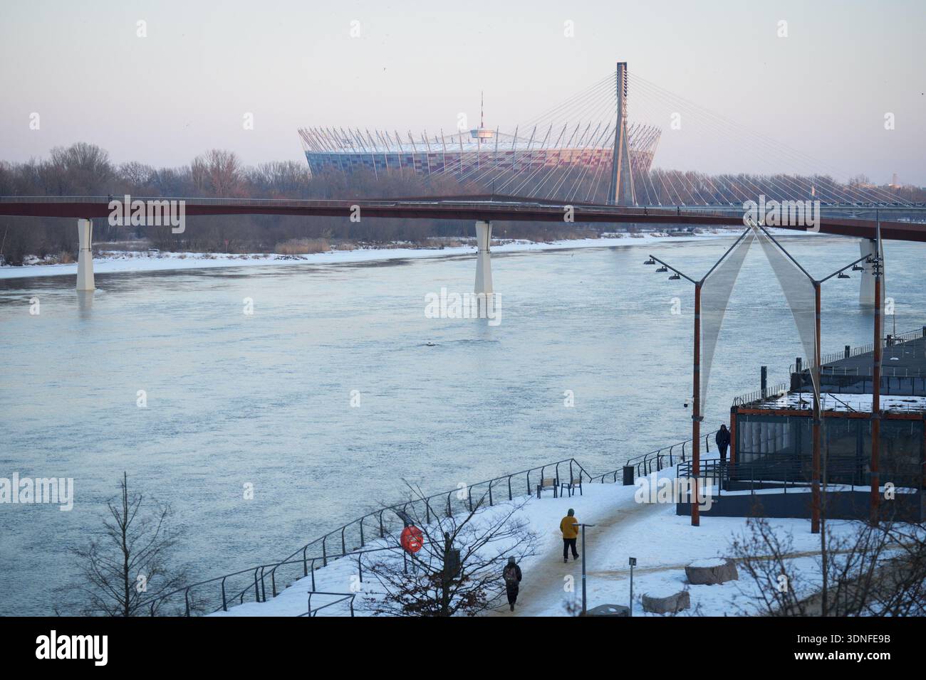 People walk along the Vistula river in Warsaw, Poland on 9 February ...