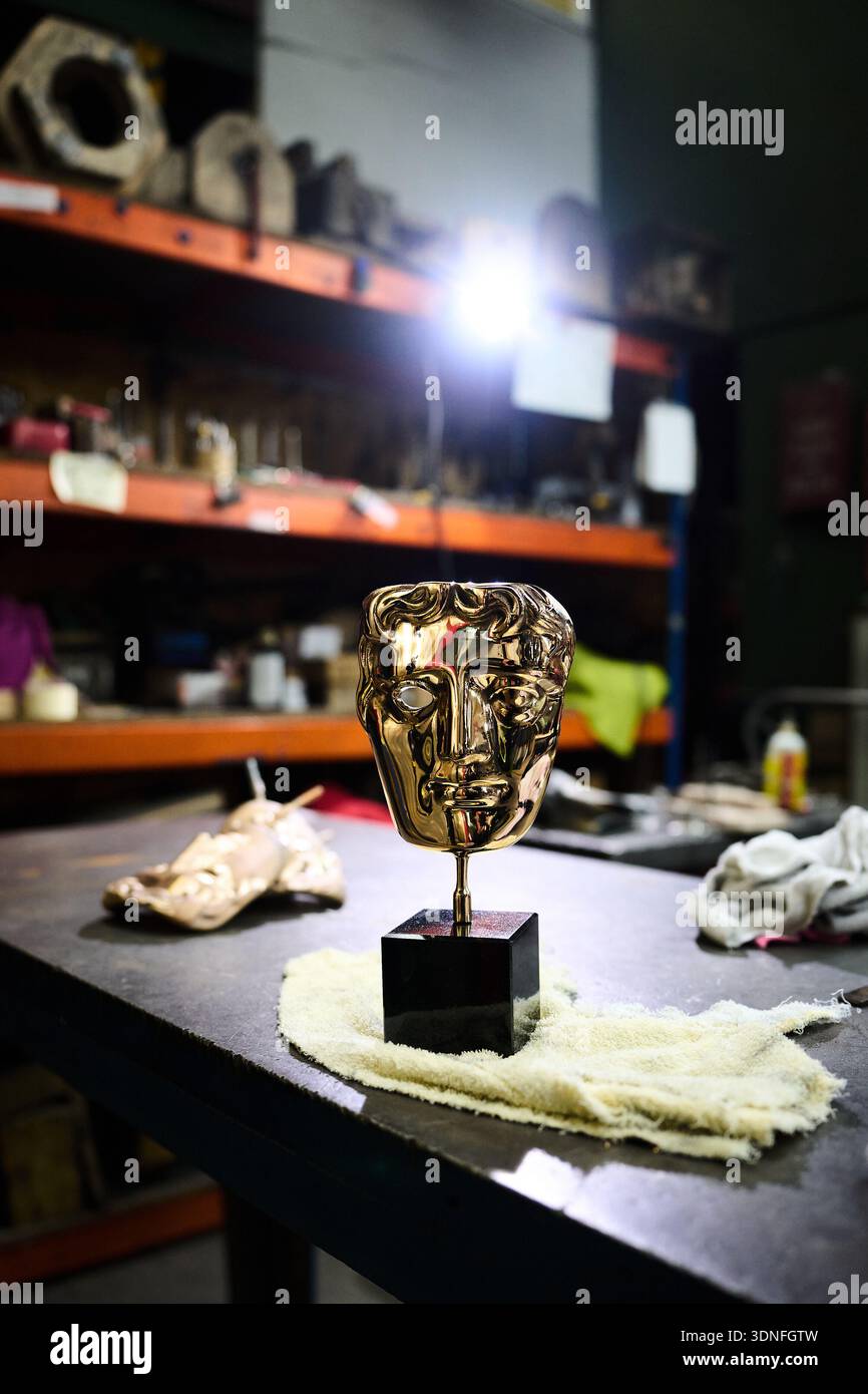 A British Academy Film Awards mask sits on a workbench during the ...
