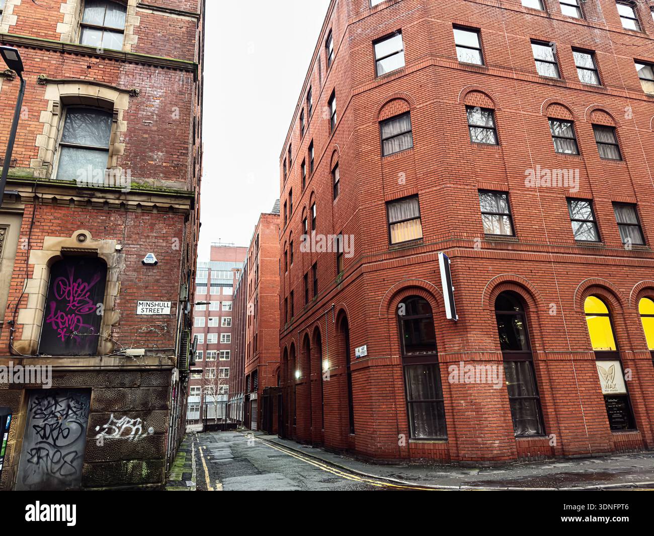 Manchester, UK - January 22, 2026: Narrow urban Minshull alley between ...