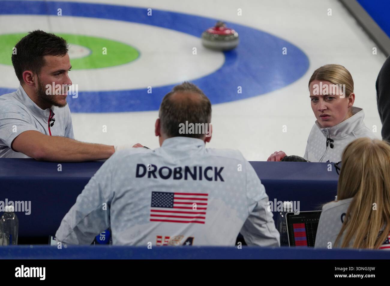 United States' Cory Thiesse and Korey Dropkin talk as they compete ...