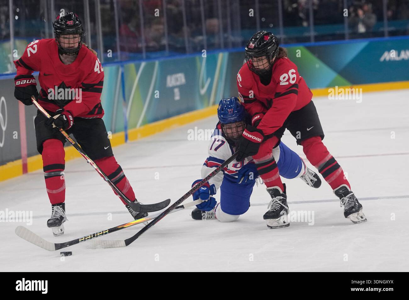 United States' Britta Curl is challenged by Canada's Emily Clark during ...