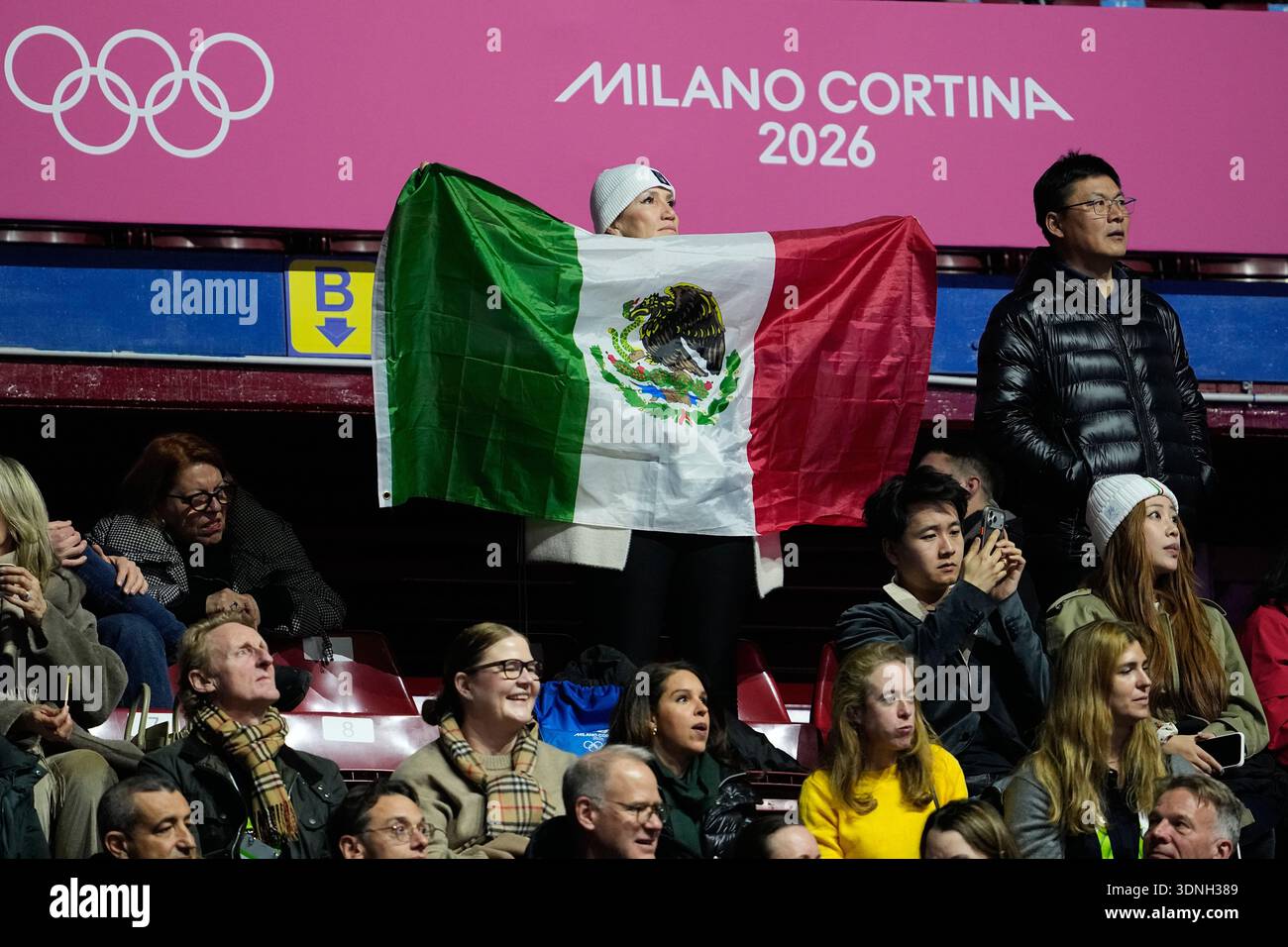 Fans cheer during the men's figure skating short program at the 2026 ...