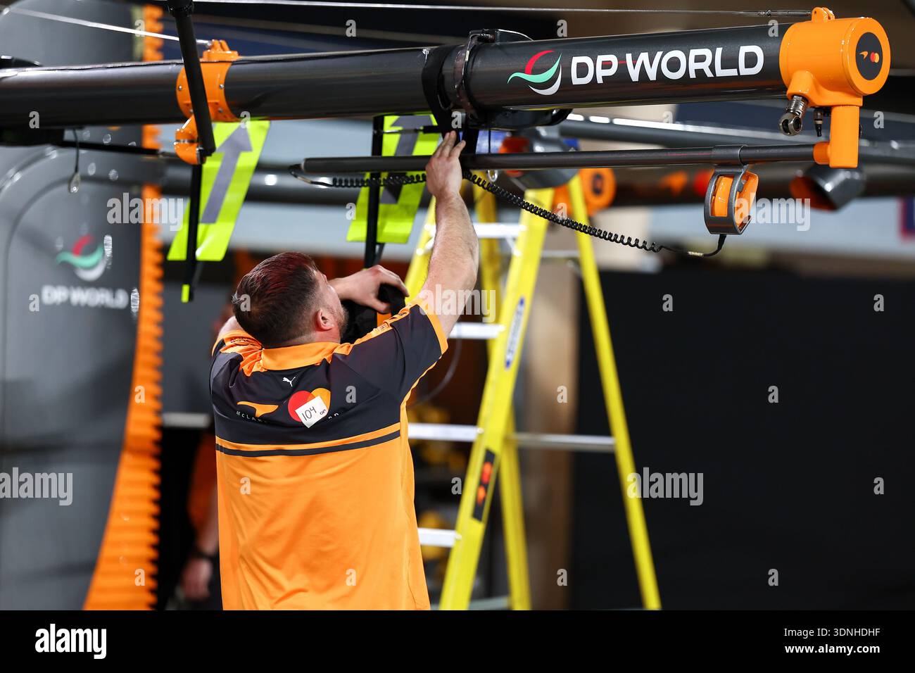 McLaren Mastercard F1 Team crew working in the pit on the eve of ...