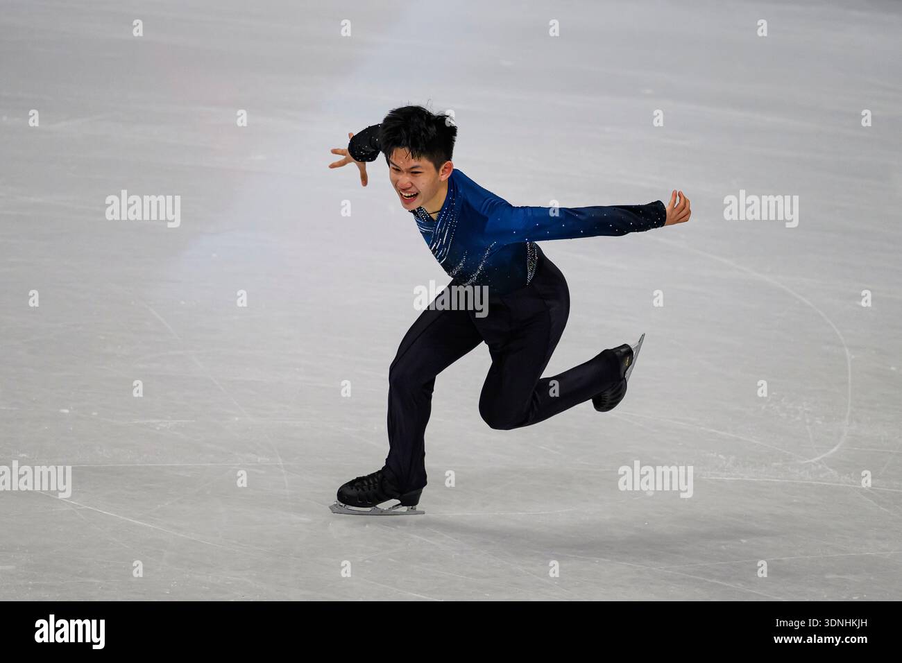 MILAN, ITALY. February 10: LI Yu-Hsiang (TPE) competes in men single ...