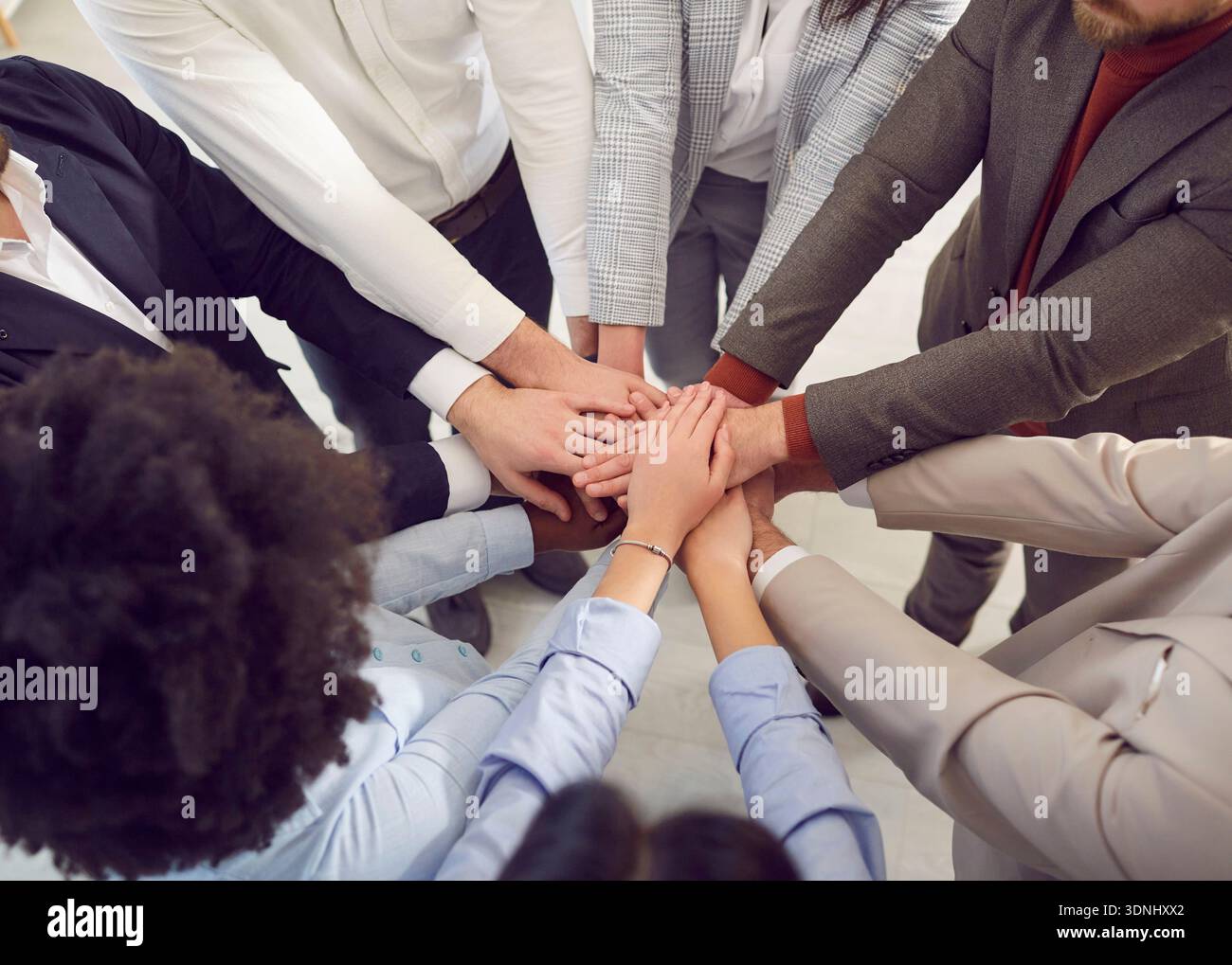 Happy colleague team high five close up together to celebrate great ...