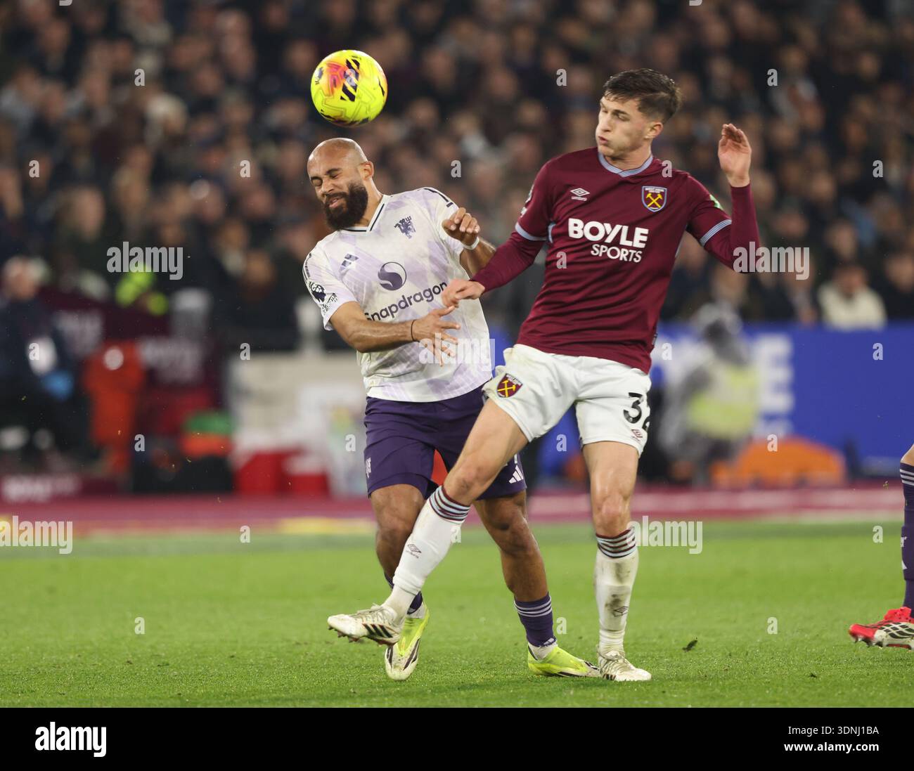 Bryan Mbeumo (MU) Freddie Potts (WHU) at the West Ham United v ...