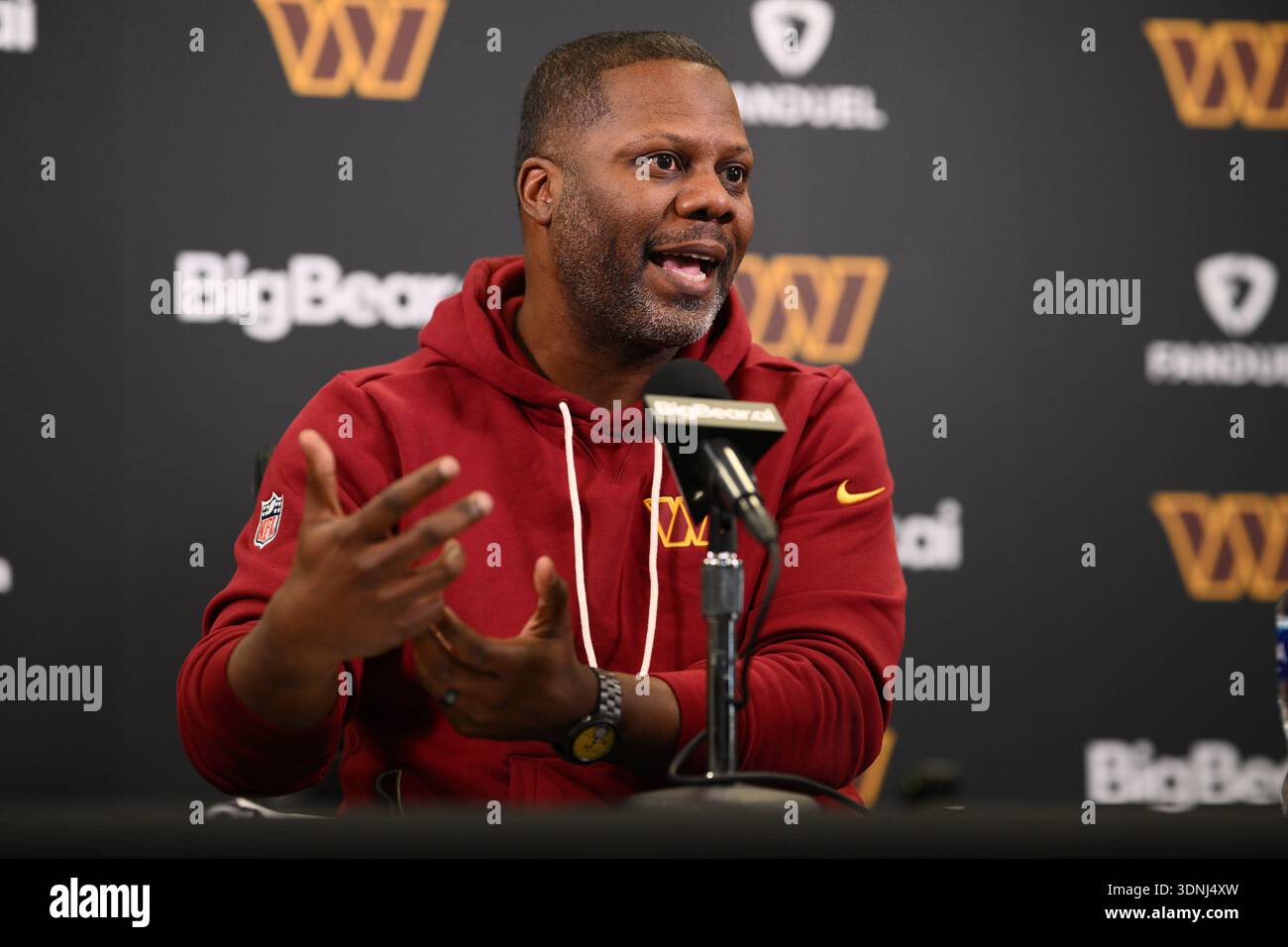 Washington Commanders defensive coordinator Daronte Jones speaks to the ...