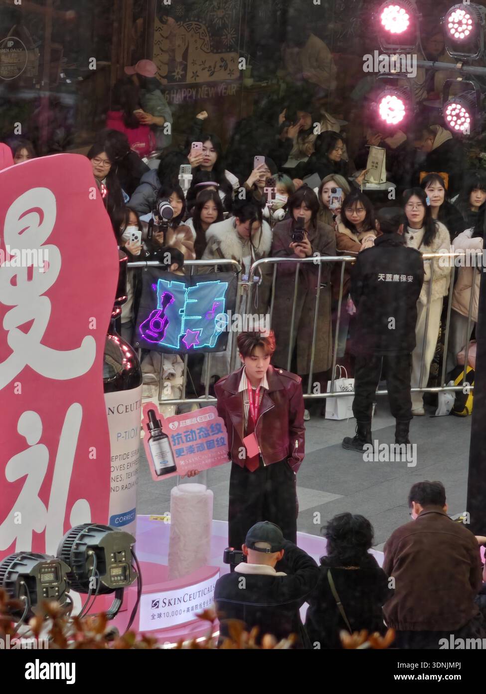 Chinese singer Zhang Xingte interacts with fans at a brand event in ...