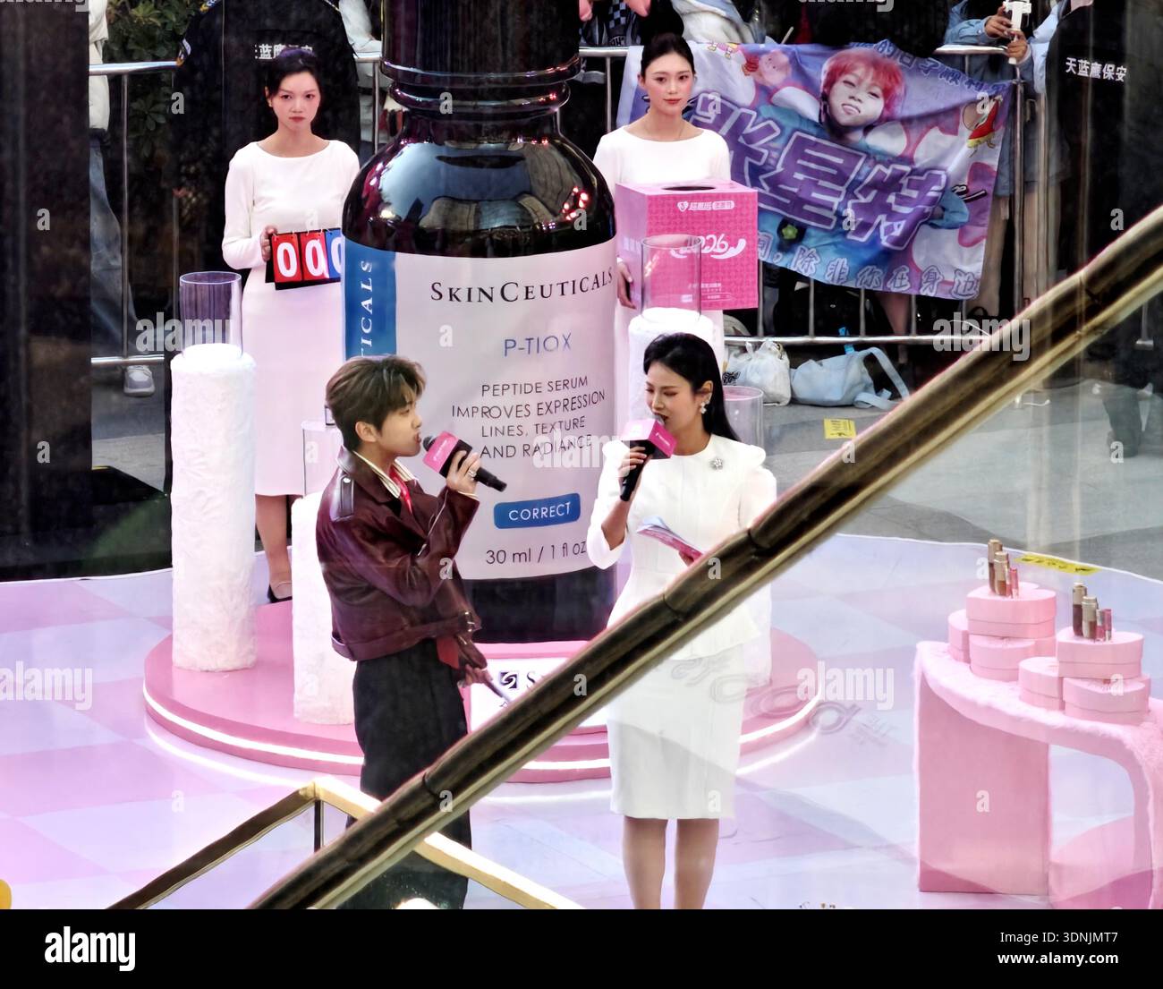 Chinese singer Zhang Xingte interacts with fans at a brand event in ...