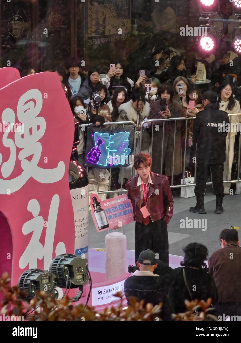 Chinese singer Zhang Xingte interacts with fans at a brand event in ...