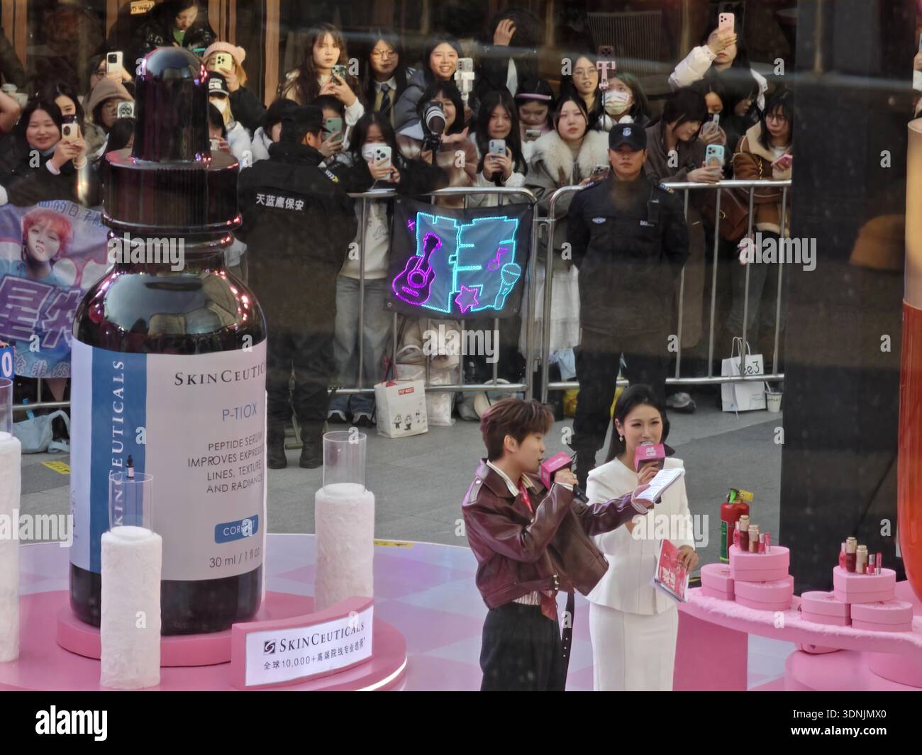 Chinese singer Zhang Xingte interacts with fans at a brand event in ...
