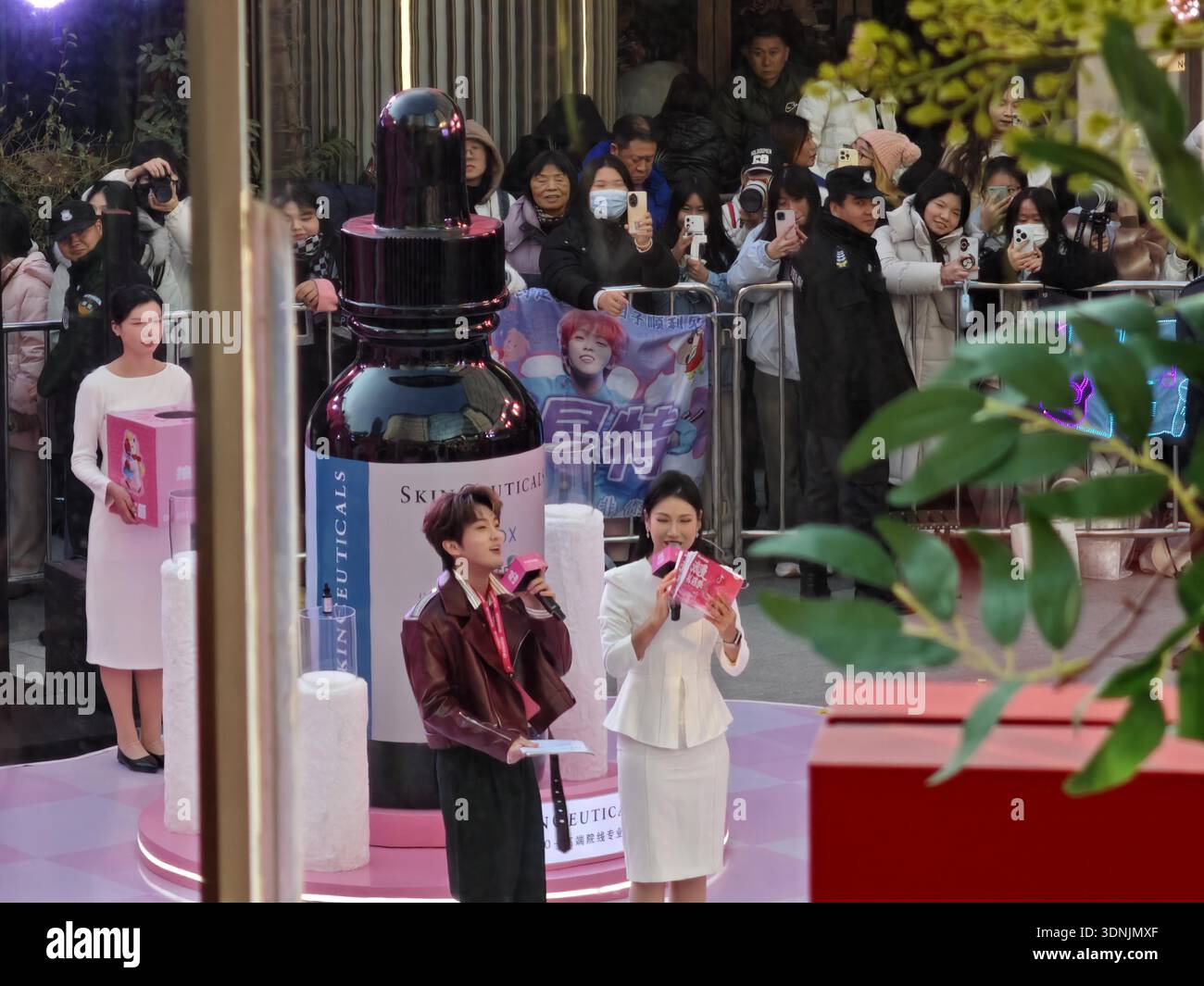 Chinese singer Zhang Xingte interacts with fans at a brand event in ...