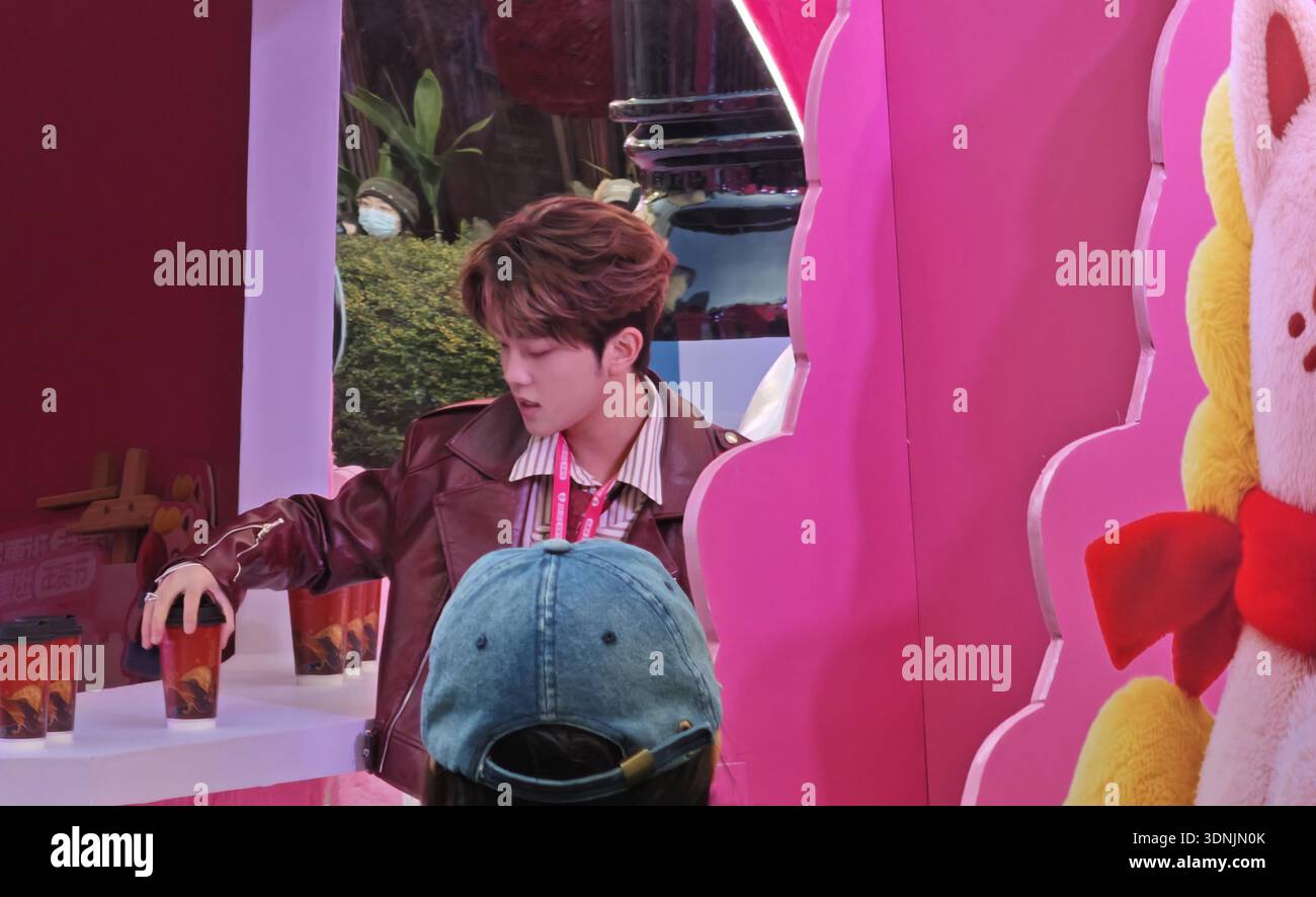Chinese singer Zhang Xingte interacts with fans at a brand event in ...