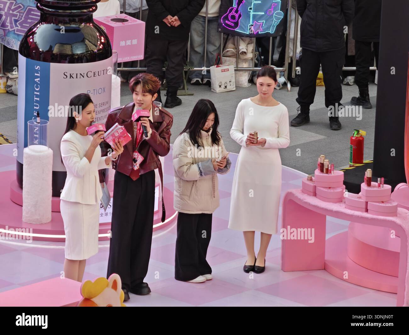 Chinese singer Zhang Xingte interacts with fans at a brand event in ...