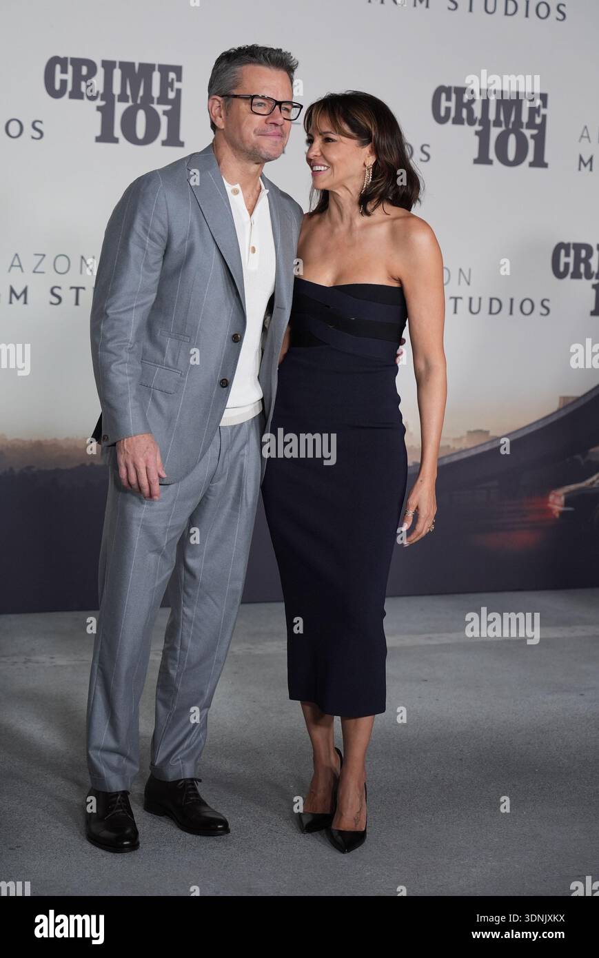 Matt Damon and Luciana Barroso arrive at the premiere of "Crime 101" on ...