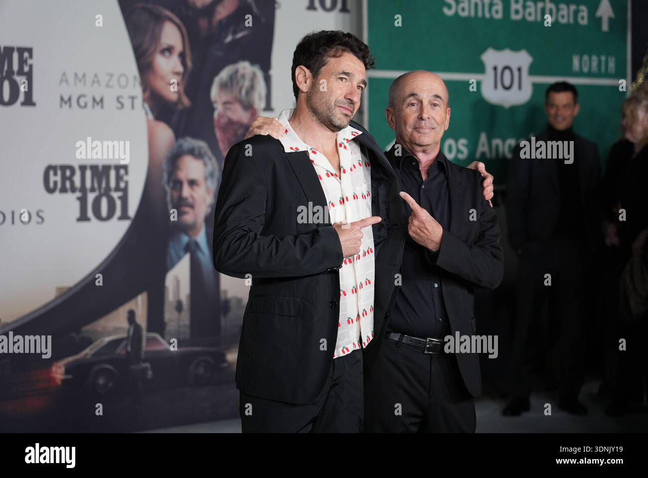 Bart Layton,left, and Don Winslow arrive at the premiere of "Crime 101 ...