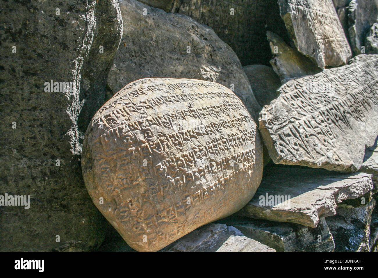 Mani stones serve as spiritual markers hi-res stock photography and ...