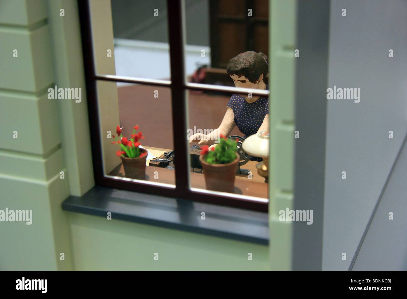 Glimpse into a Miniature World Through a Window Stock Photo - Alamy
