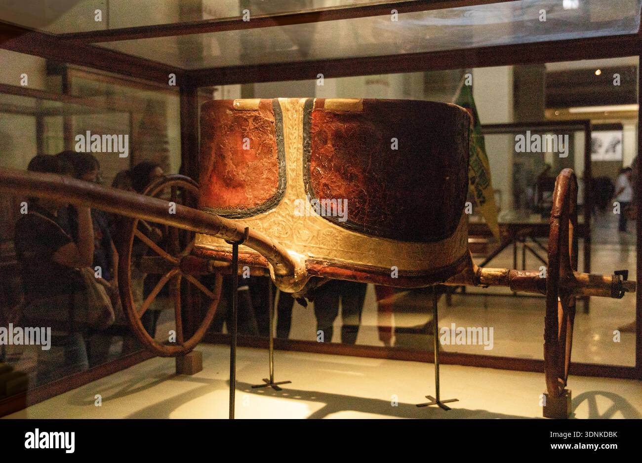Ancient ceremonial chariot exhibited inside a museum glass case in ...