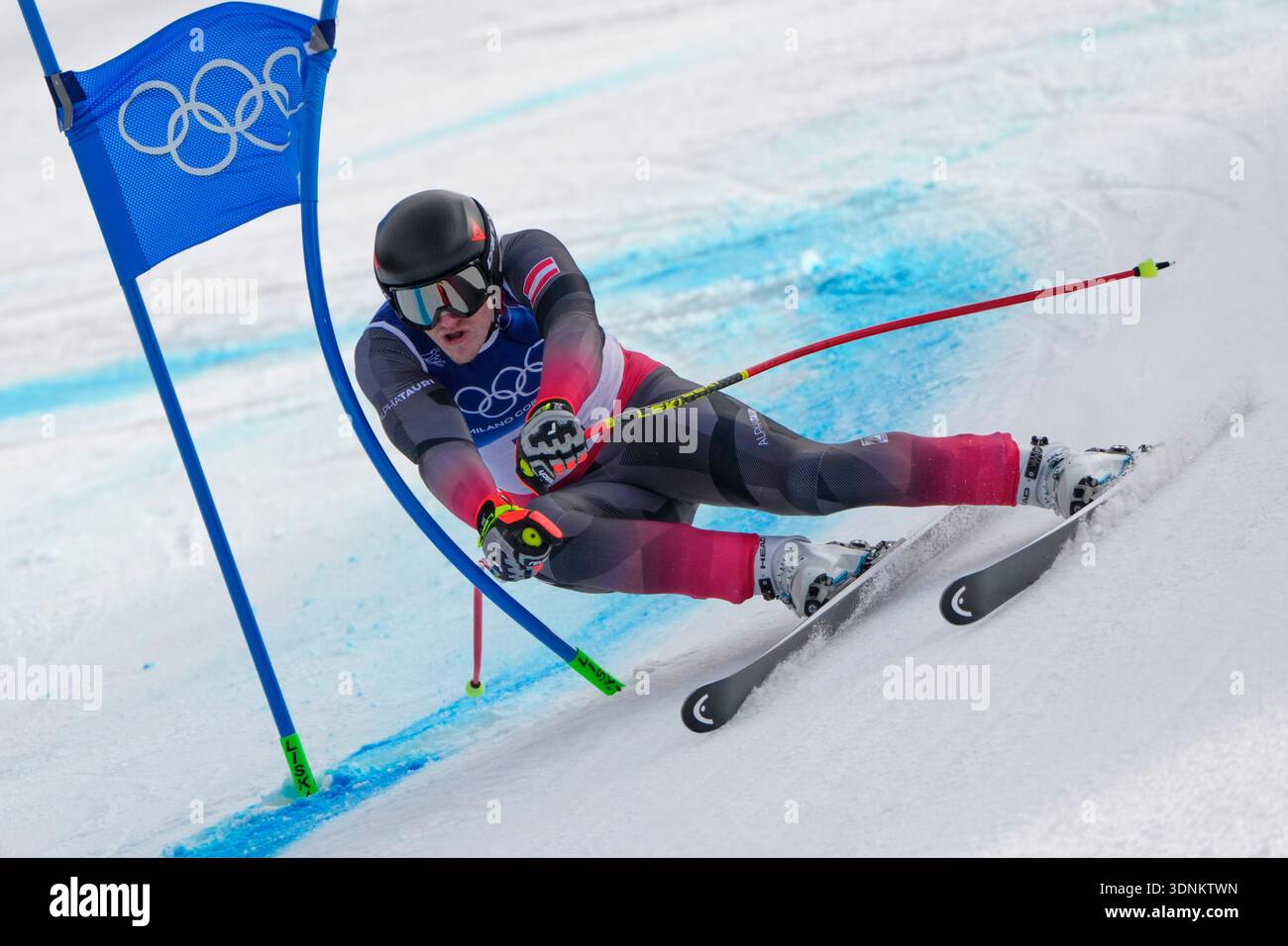 Austria's Stefan Babinsky speeds down the course, during a men's super ...