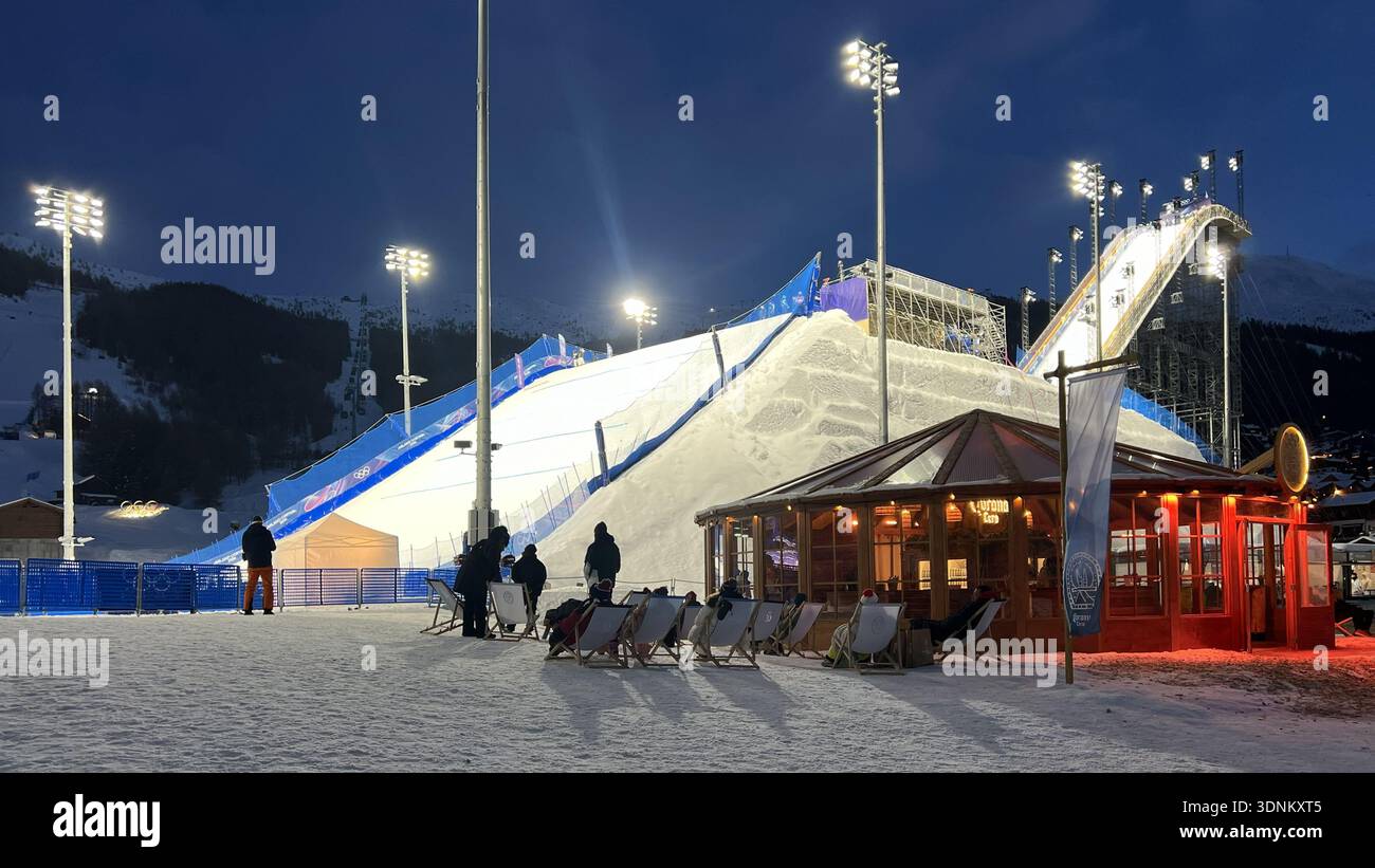 Livigno, Italy - February 9, 2026: Snowboard Big Air venue illuminated ...