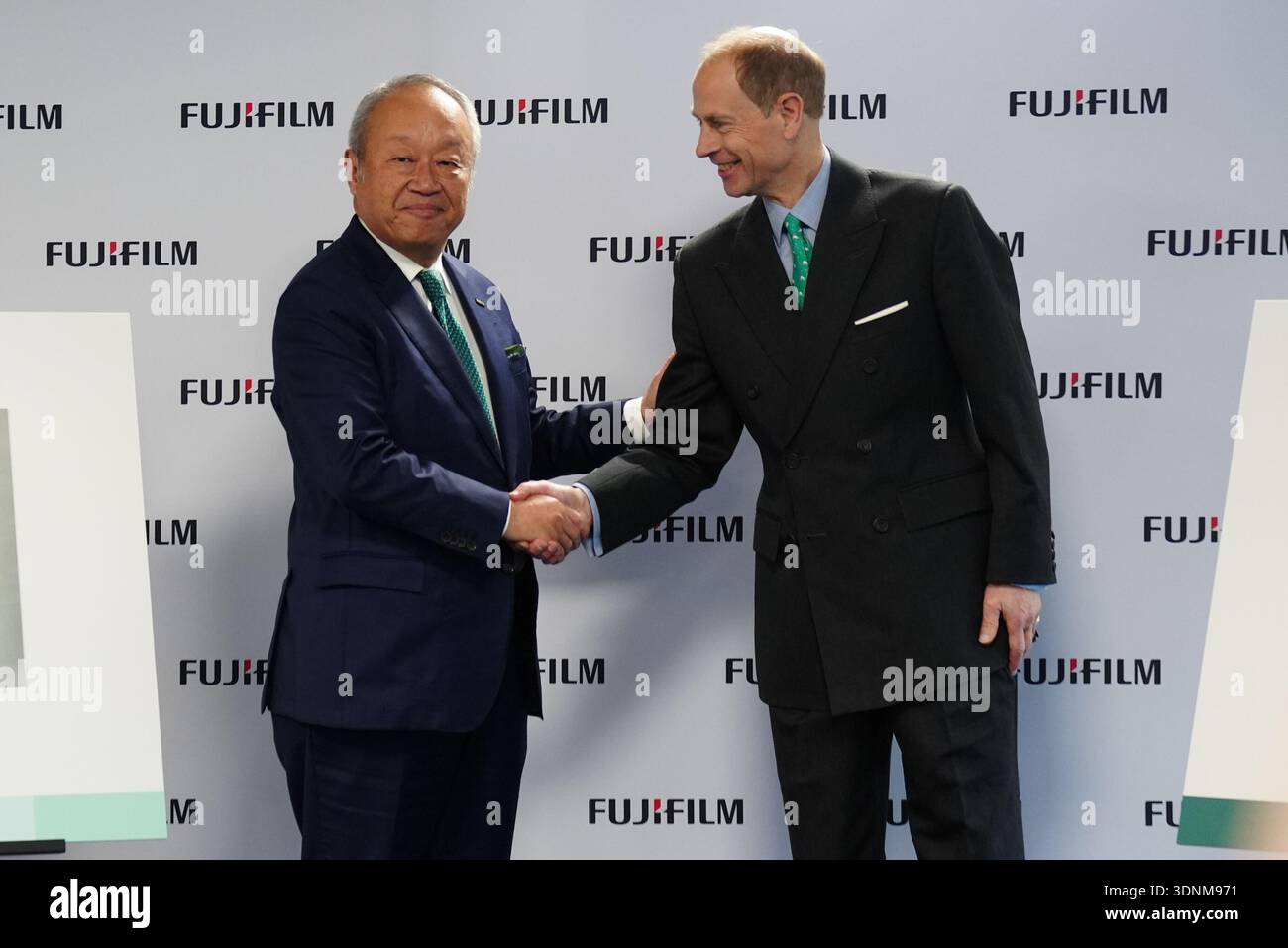 The Duke of Edinburgh shakes hands with Teiichi Goto (left), Fujifilm ...