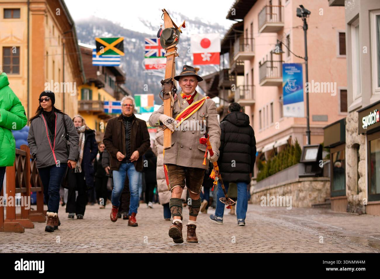 Walter Strohmeier, the director of a ski museum, walks amongst visitors ...