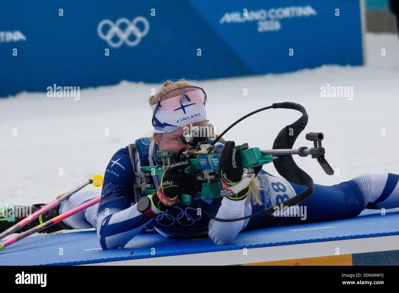Finland's Suvi Minkkinen (38) shoots during a women's biathlon 15 ...