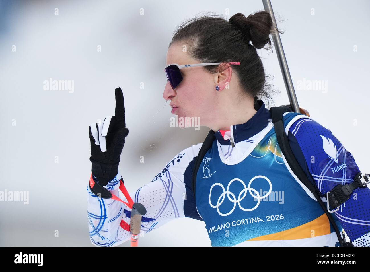 Julia Simon, of France, gestures after competing in the women's 15 ...