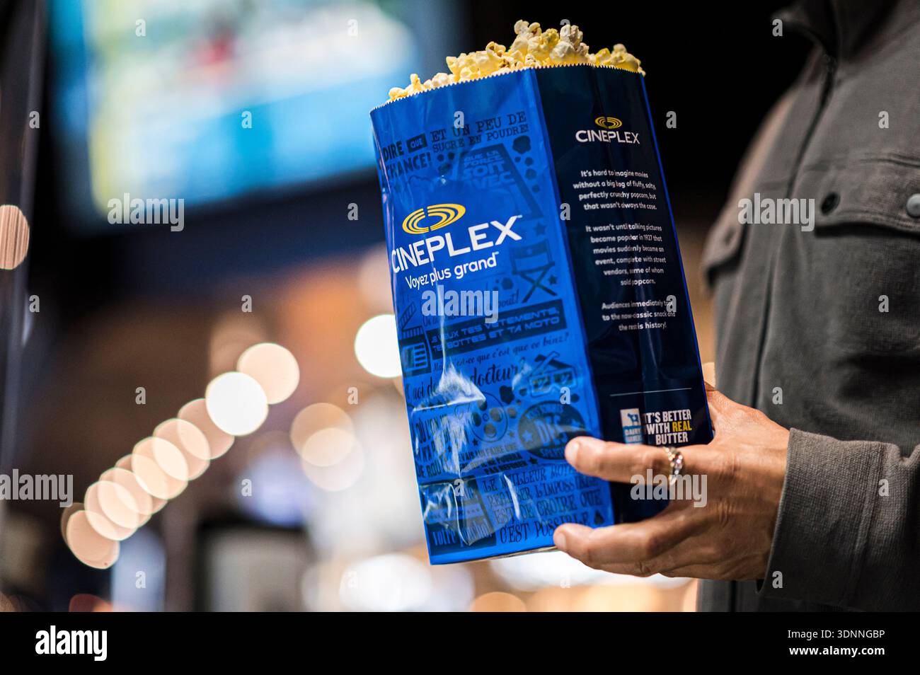 Customers buy popcorn at a Cineplex theatre in downtown Toronto on ...