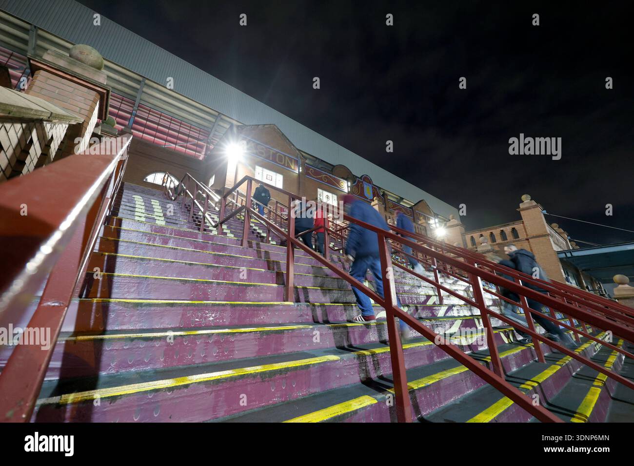 Fans climb the steps of the holt end before the Premier League match at ...