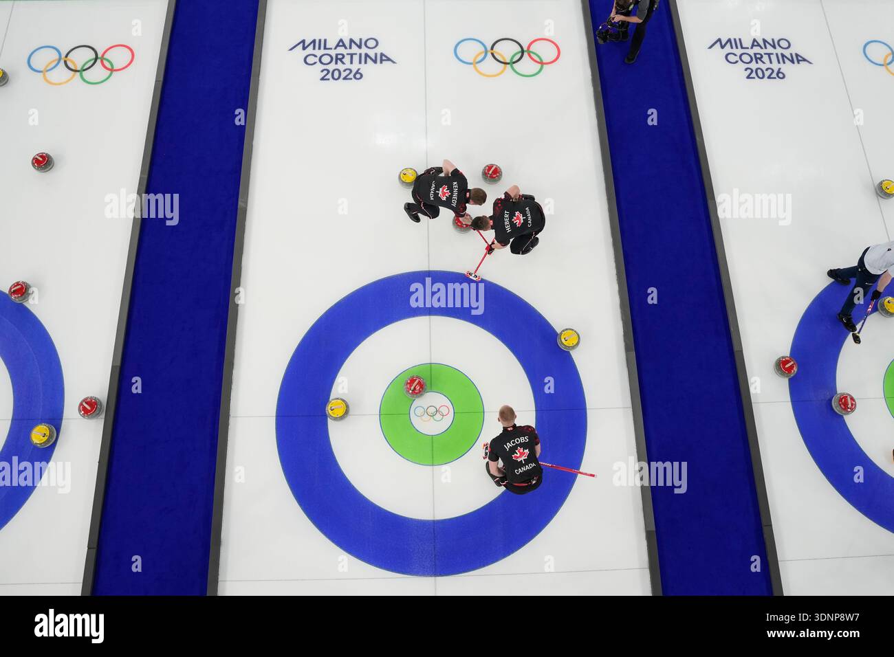 Canada's Ben Hebert, Brad Jacobs and Marc Kennedy compete during a men ...