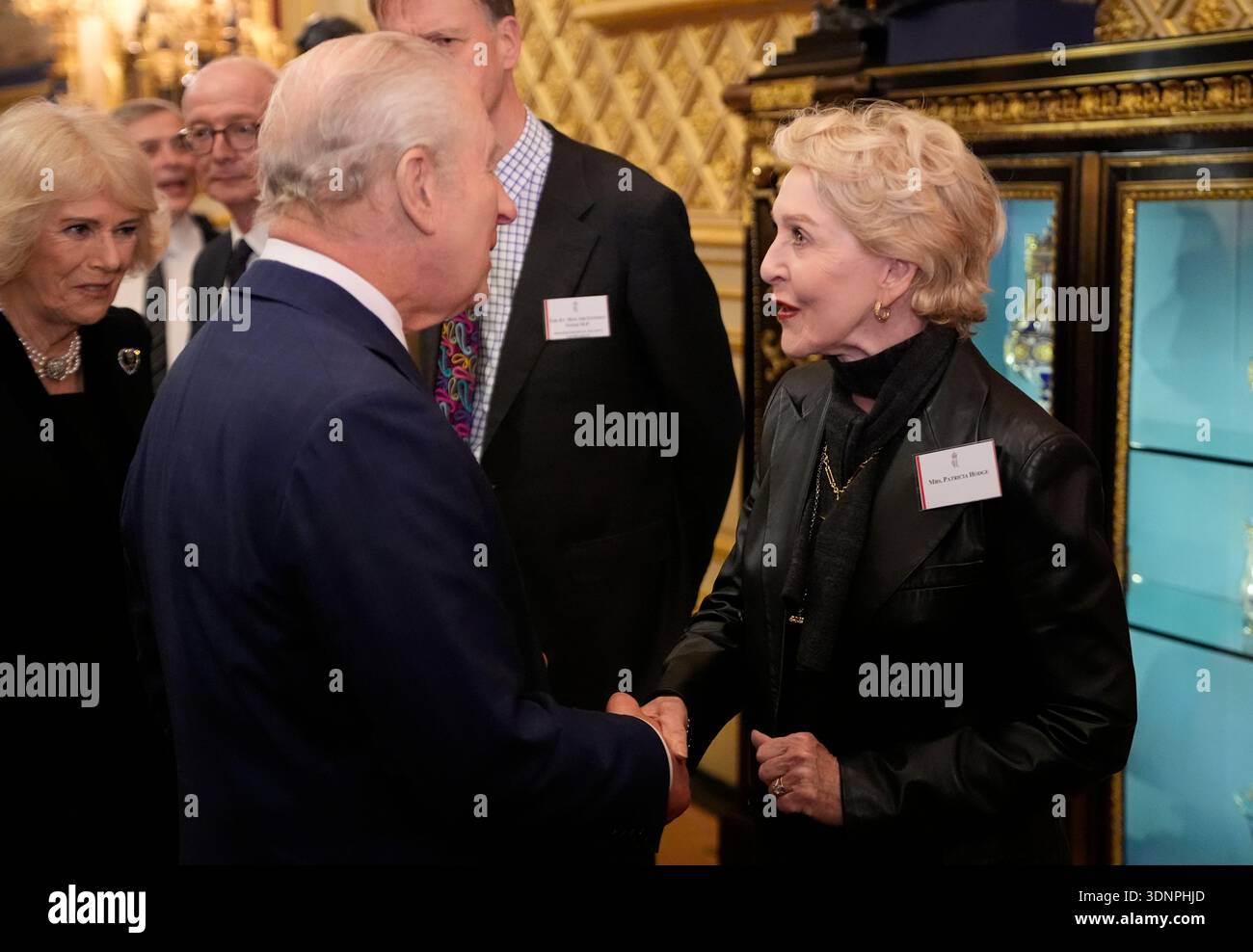 King Charles III speaks with Patricia Hodge during a reception to ...