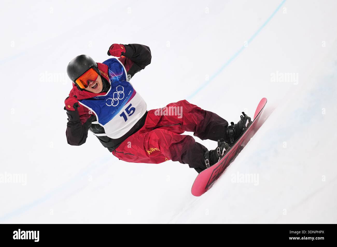 China's Wang Ziyang celebrates during the men's snowboarding halfpipe ...