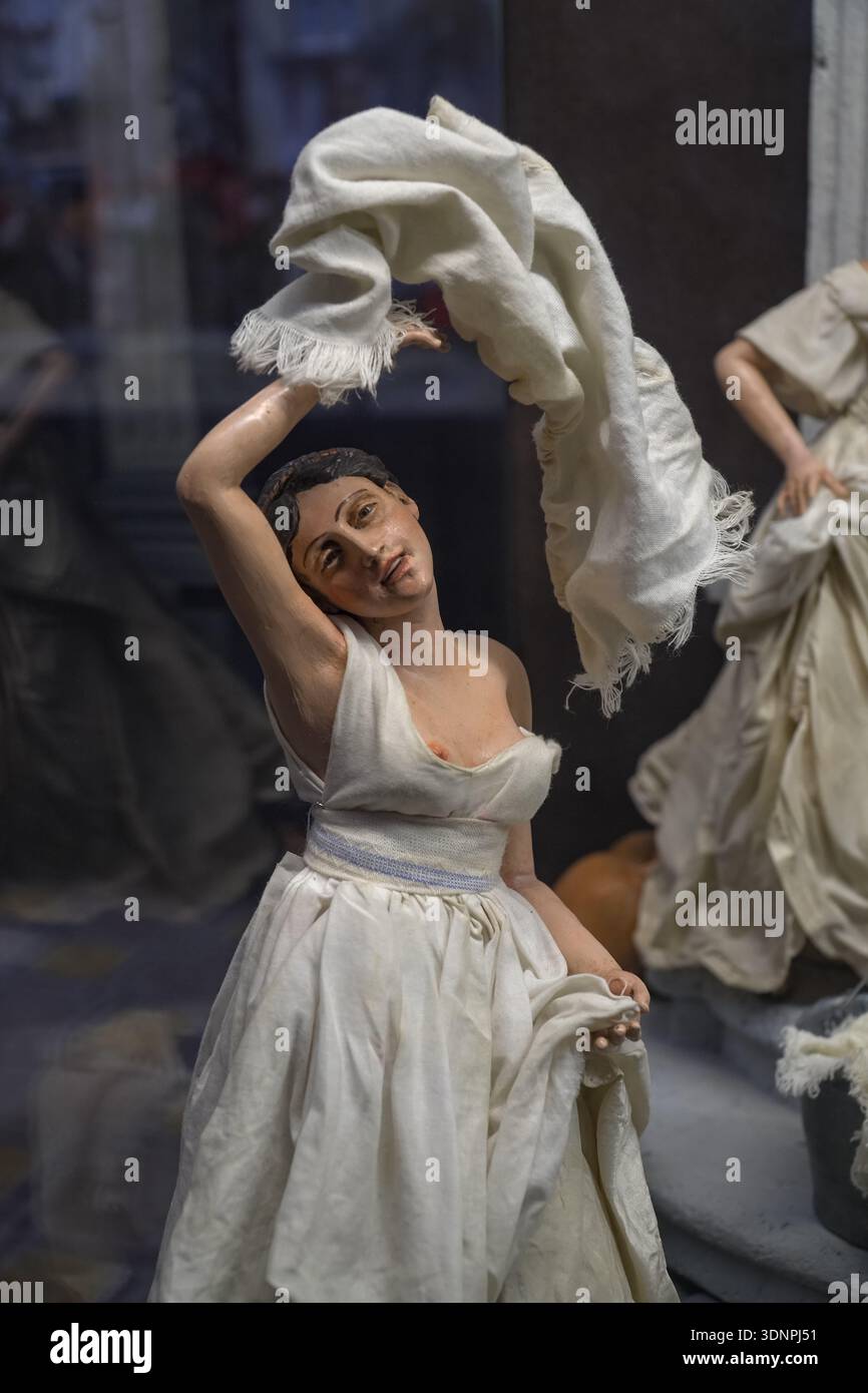 Presepe Napoletano figurine showing a woman hanging white cloth ...