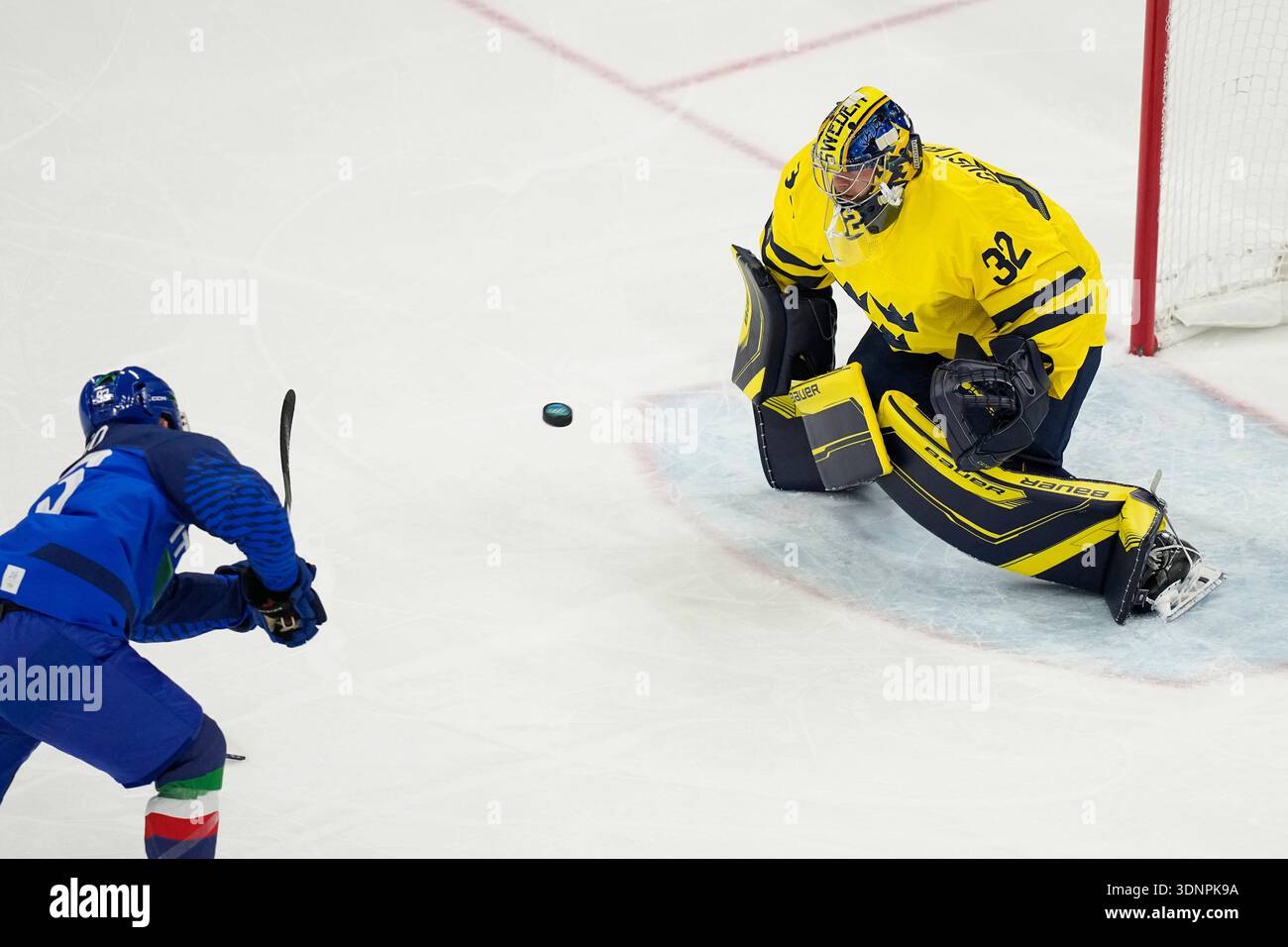 Italy's Luca Frigo, left, shoots to score his sides first goal past ...