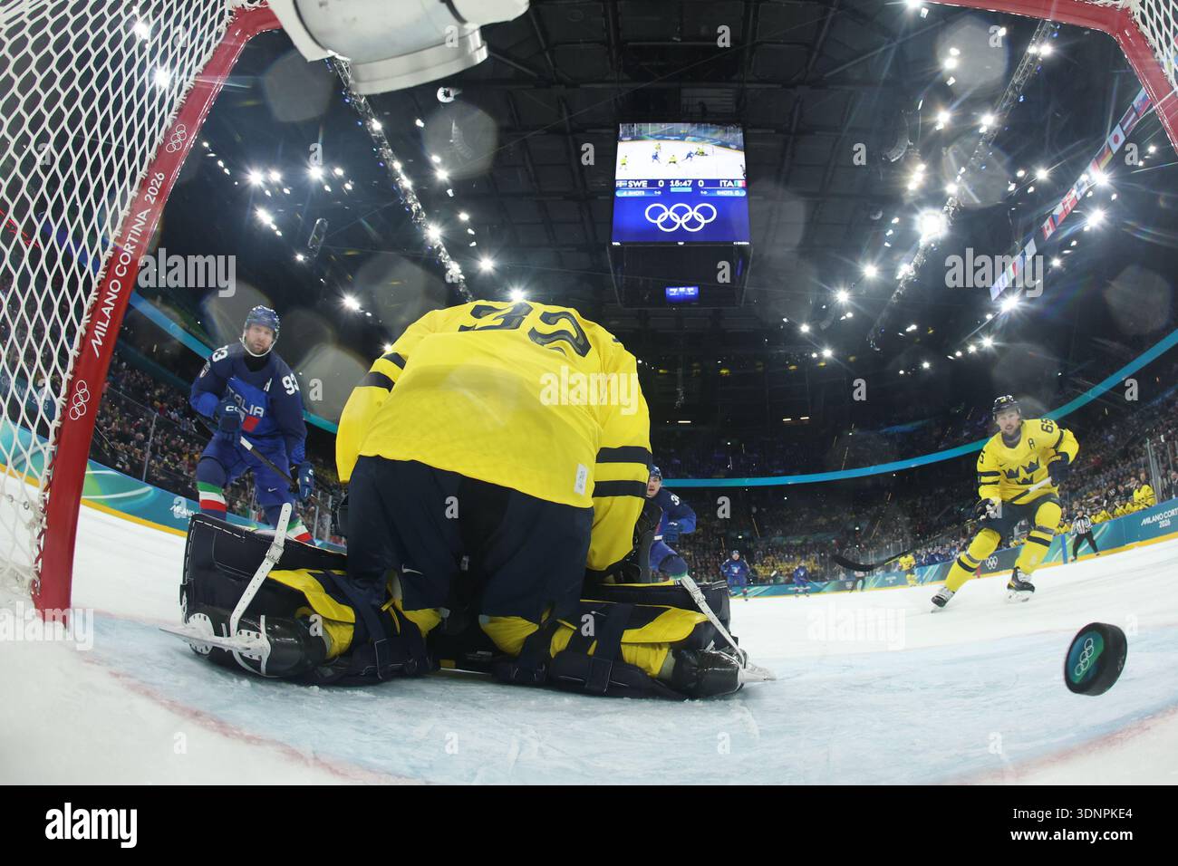 Italy's Luca Frigo, left, scores his side's opening goal during a ...