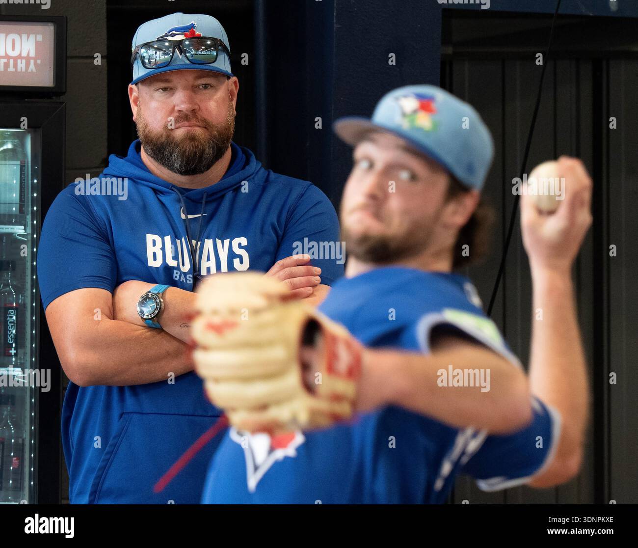 Toronto Blue Jays manager John Schneider watches as pitcher Trey ...