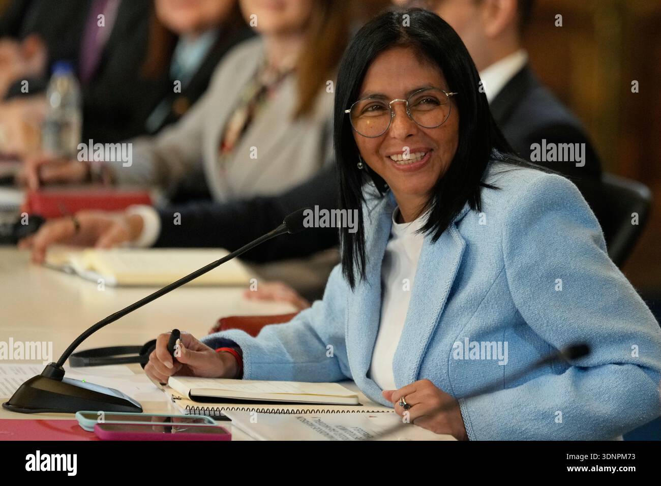Venezuela's acting President Delcy Rodriguez smiles during a meeting ...